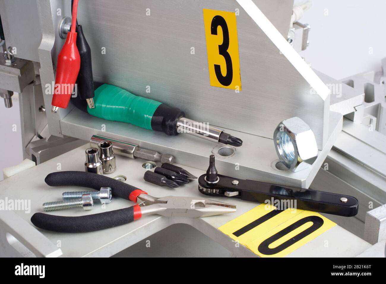 screwdriver, screw, nuts - industrial equipment repair set Stock Photo ...