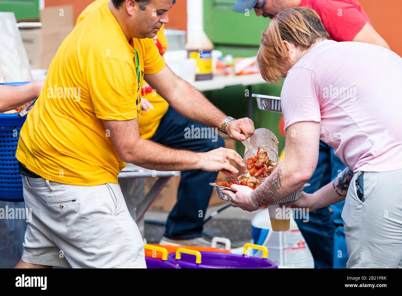 New Orleans, USA - April 23, 2018: Louisiana city with people getting ...