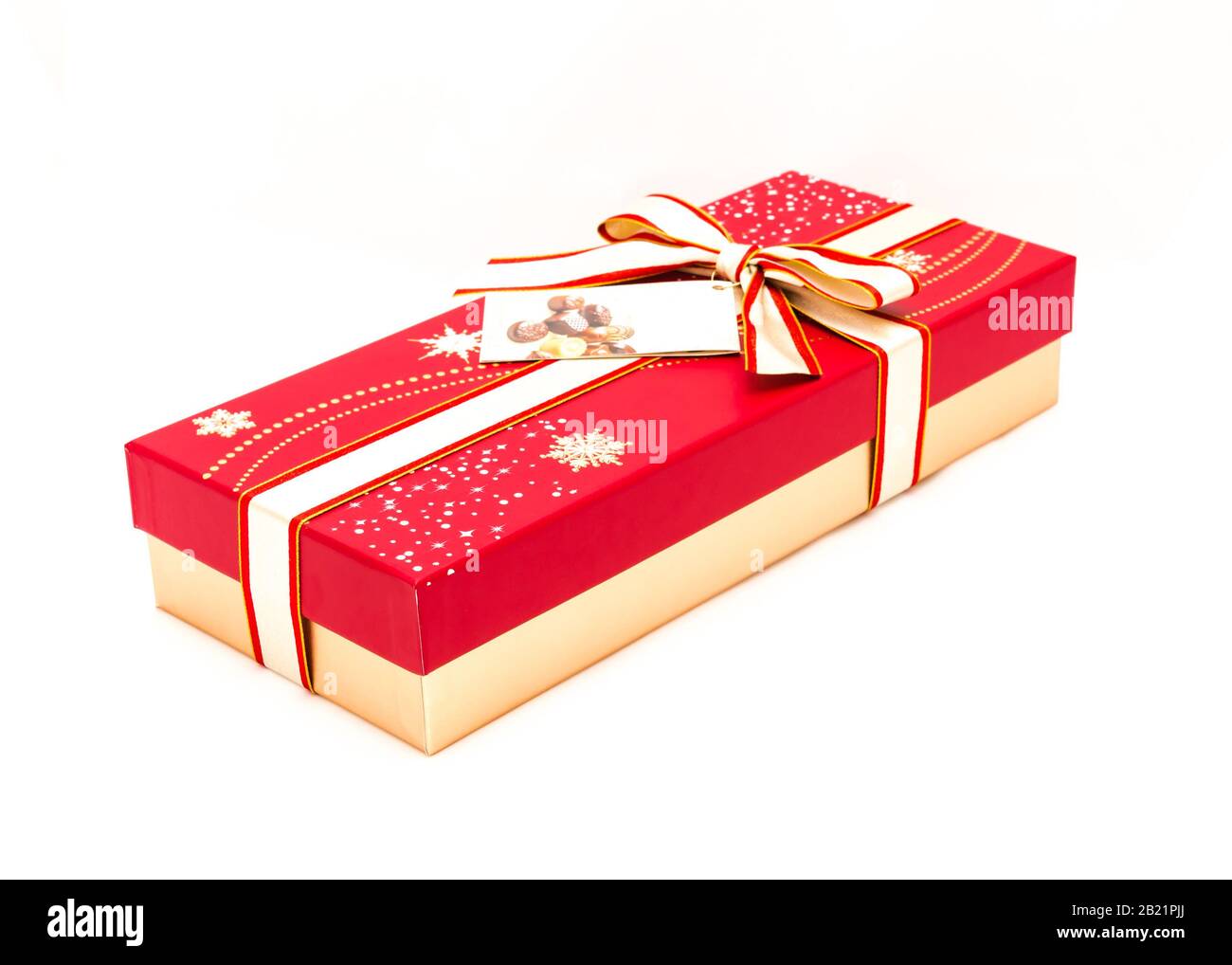 Chocolate box with tab label and red yellow color bow knot isolated on ...