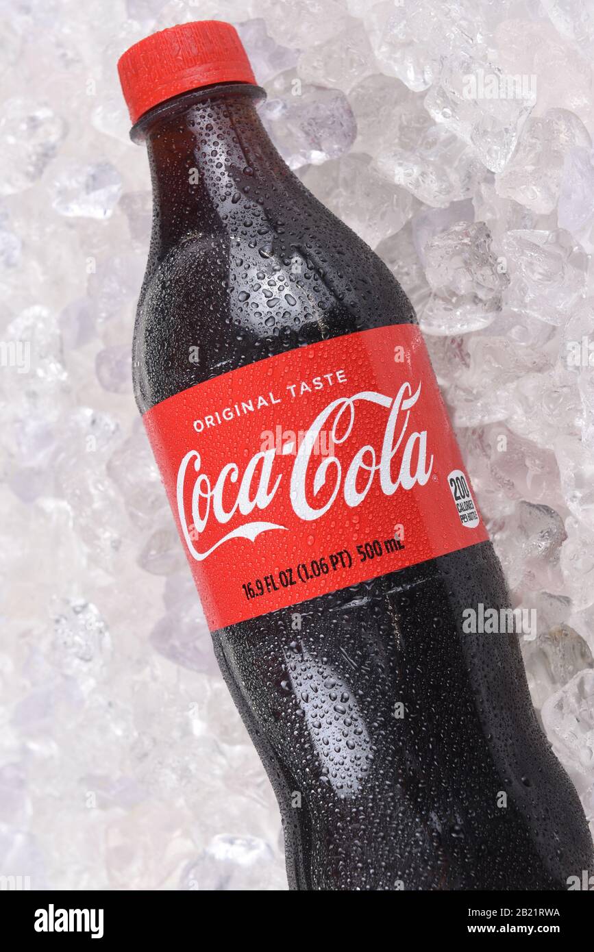IRVINE, CALIFORNIA - DECEMBER 15, 2017: A bottle of Coca-Cola on ice ...