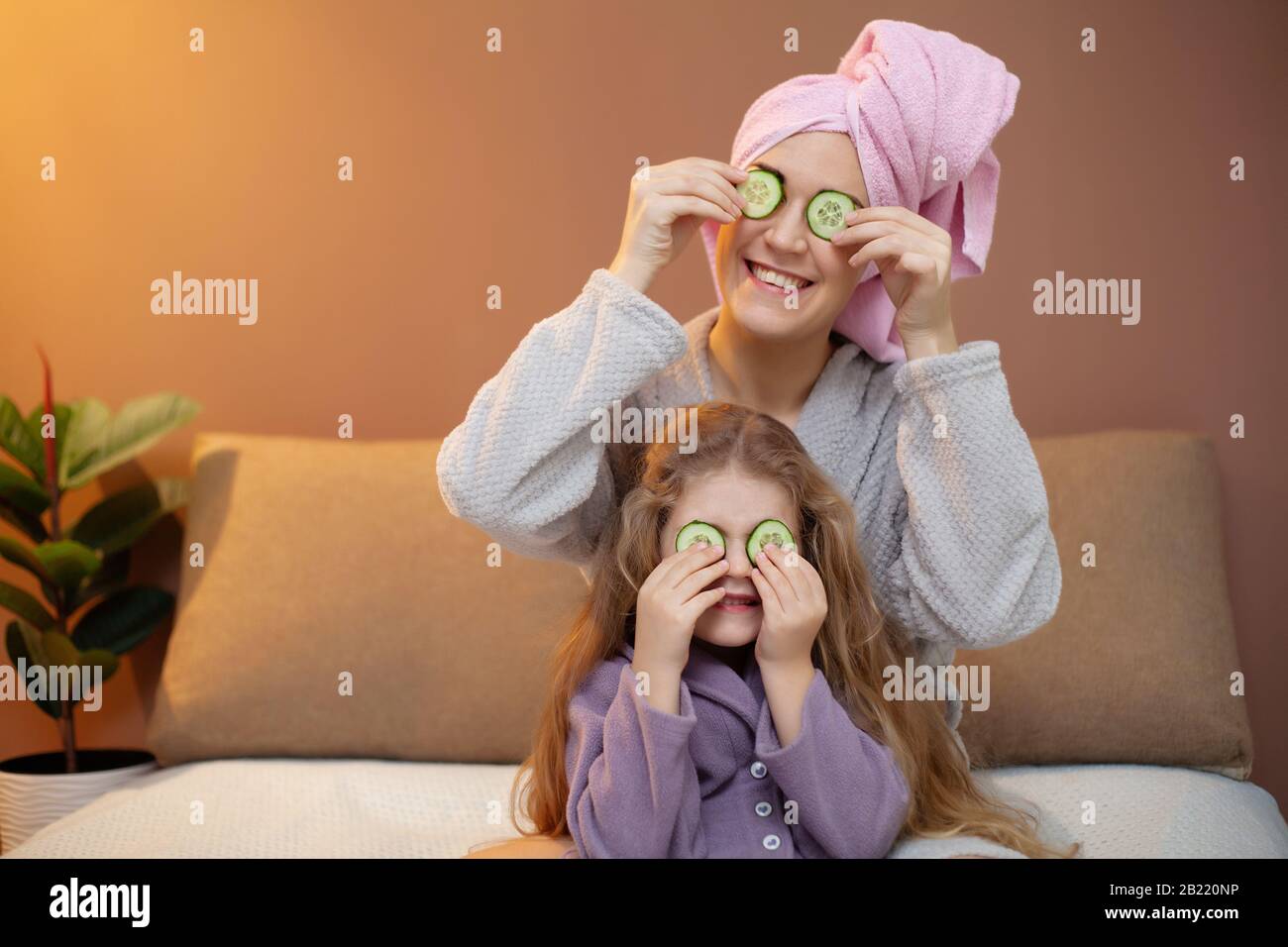 Mom and daughter doing spa treatments at home Stock Photo - Alamy