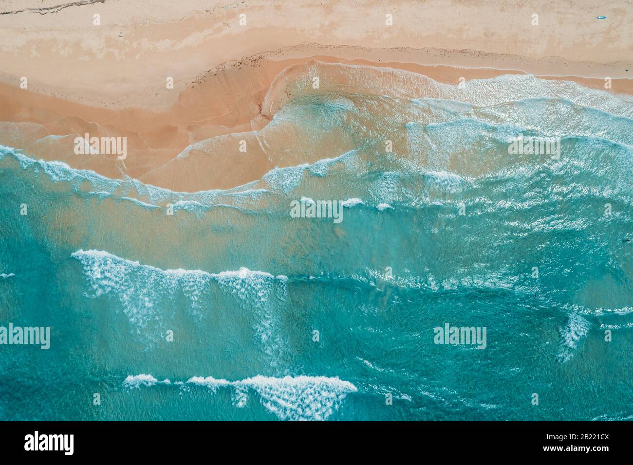 Aerial view to tropical sandy beach and blue ocean. Top view of ocean ...