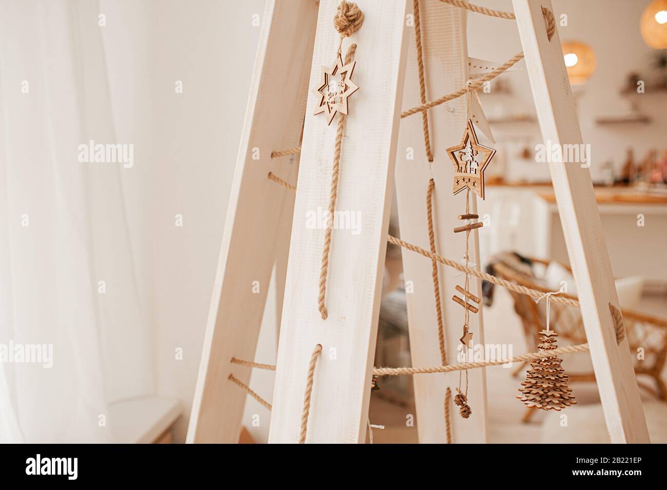 non-standard extraordinary tree made of wooden planks and rope, with ...