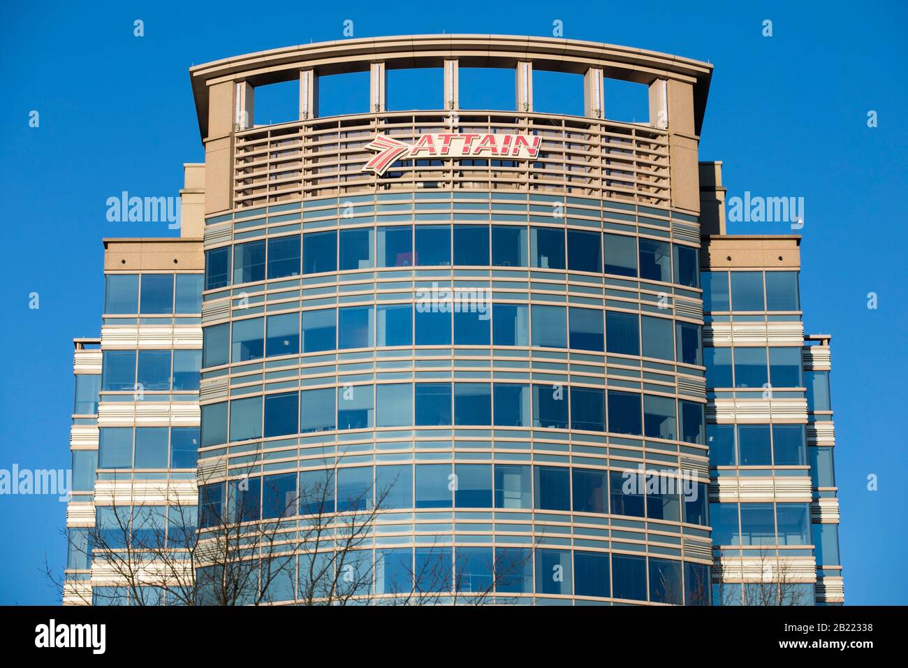 A logo sign outside of the headquarters of Attain Consulting Group in ...