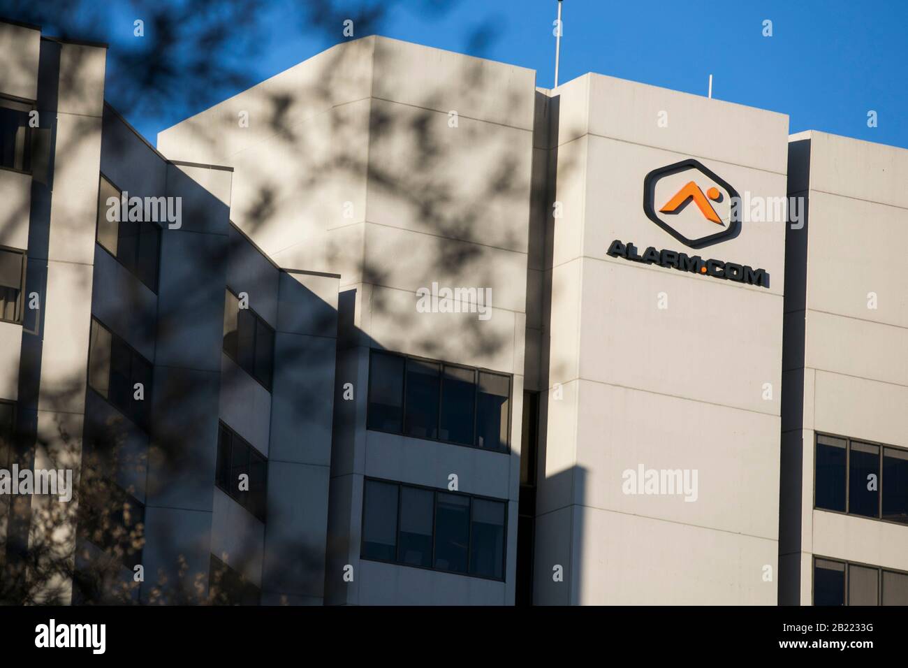 A logo sign outside of the headquarters of Alarm.com in McLean ...