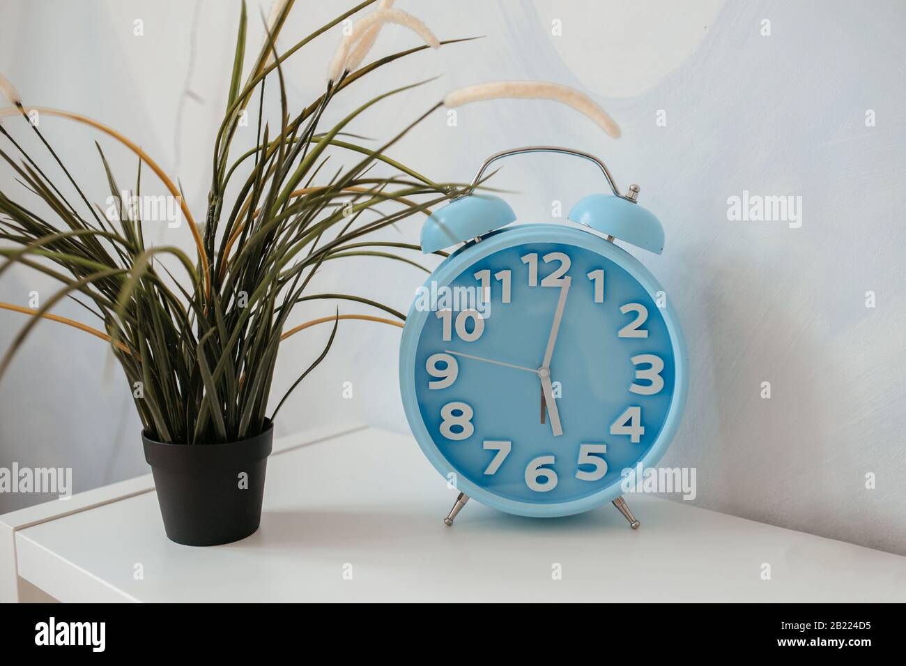 huge classic blue clock with an alarm clock for a children's room Stock ...