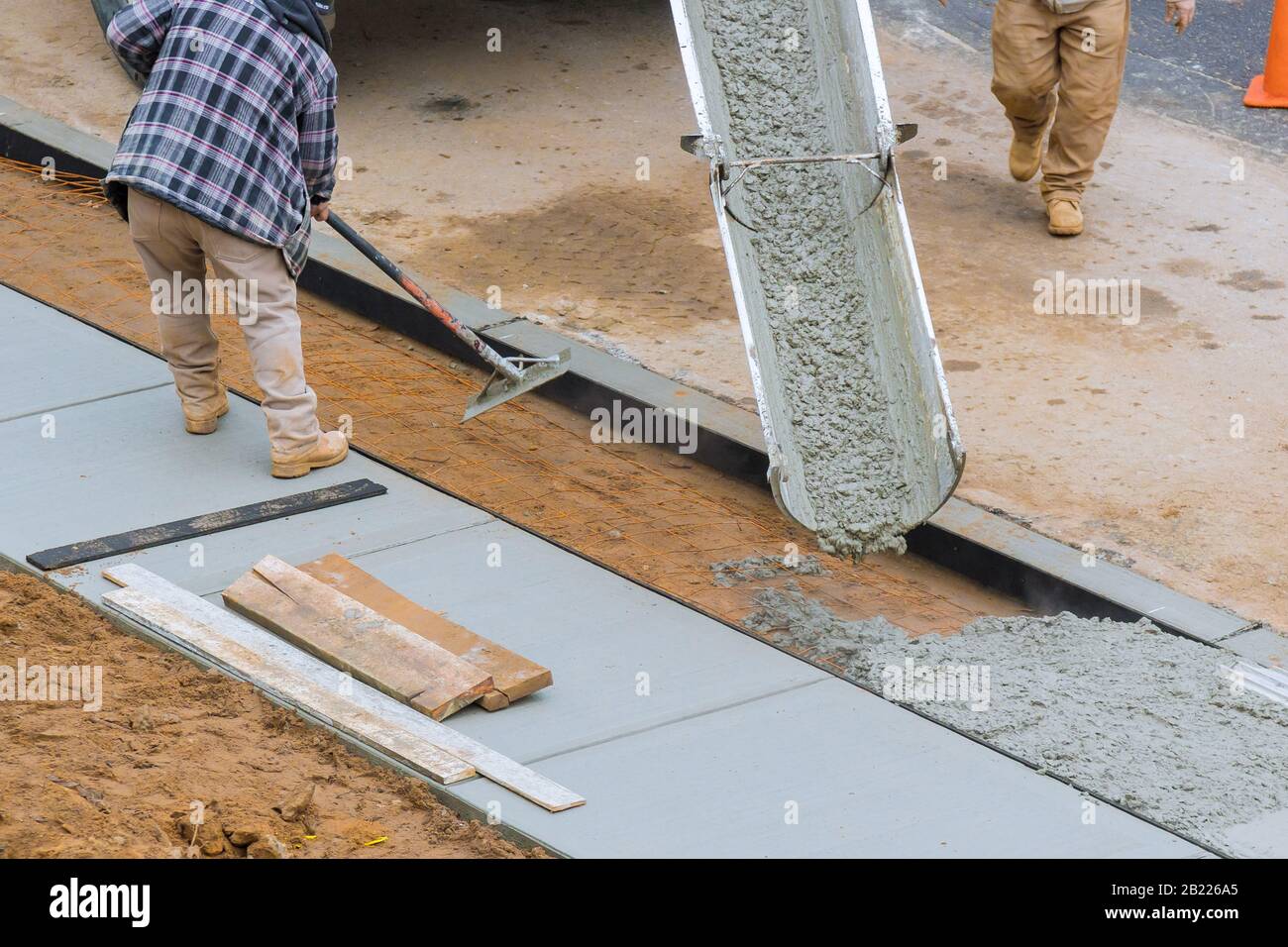 Worker working for concrete pavement for ground flooring at ...