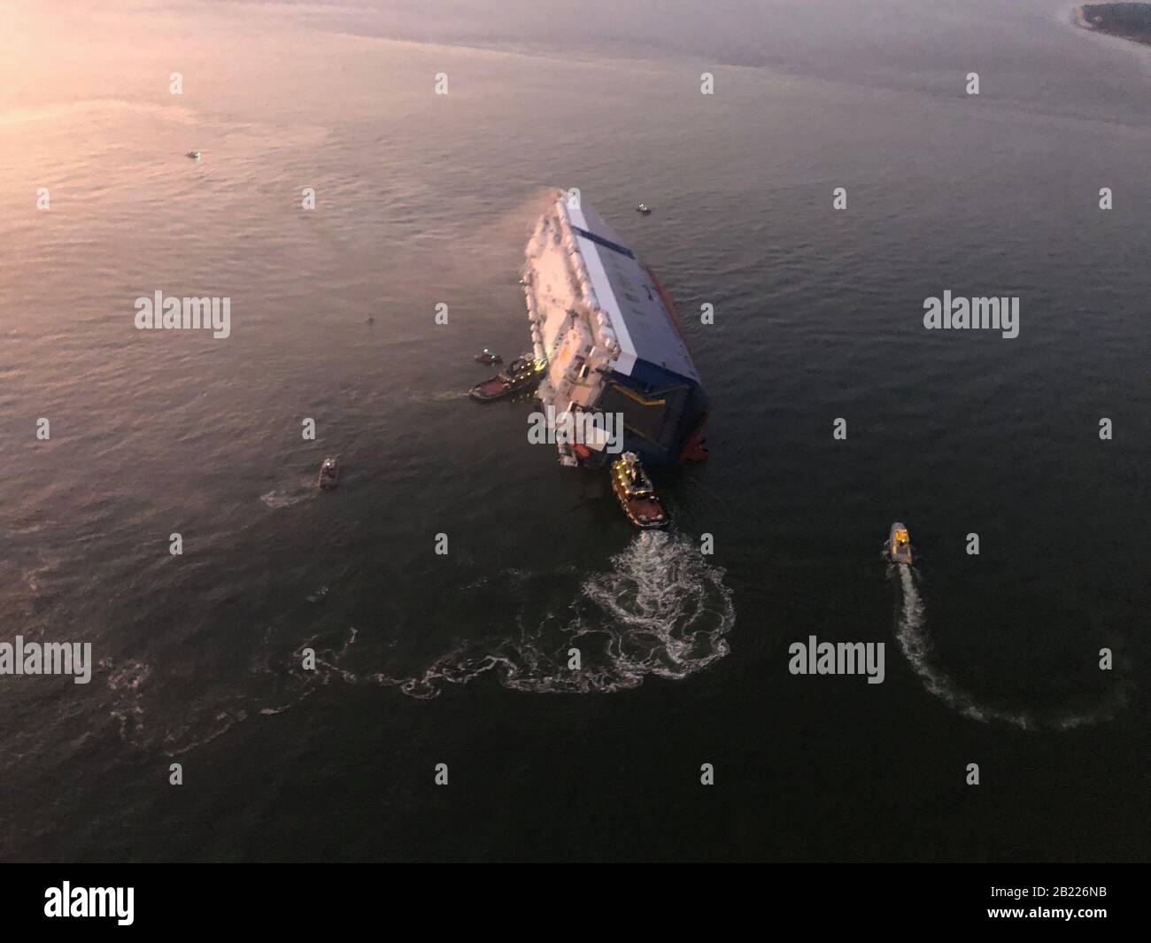 The Coast Guard and port partners respond to the 656-foot vehicle ...