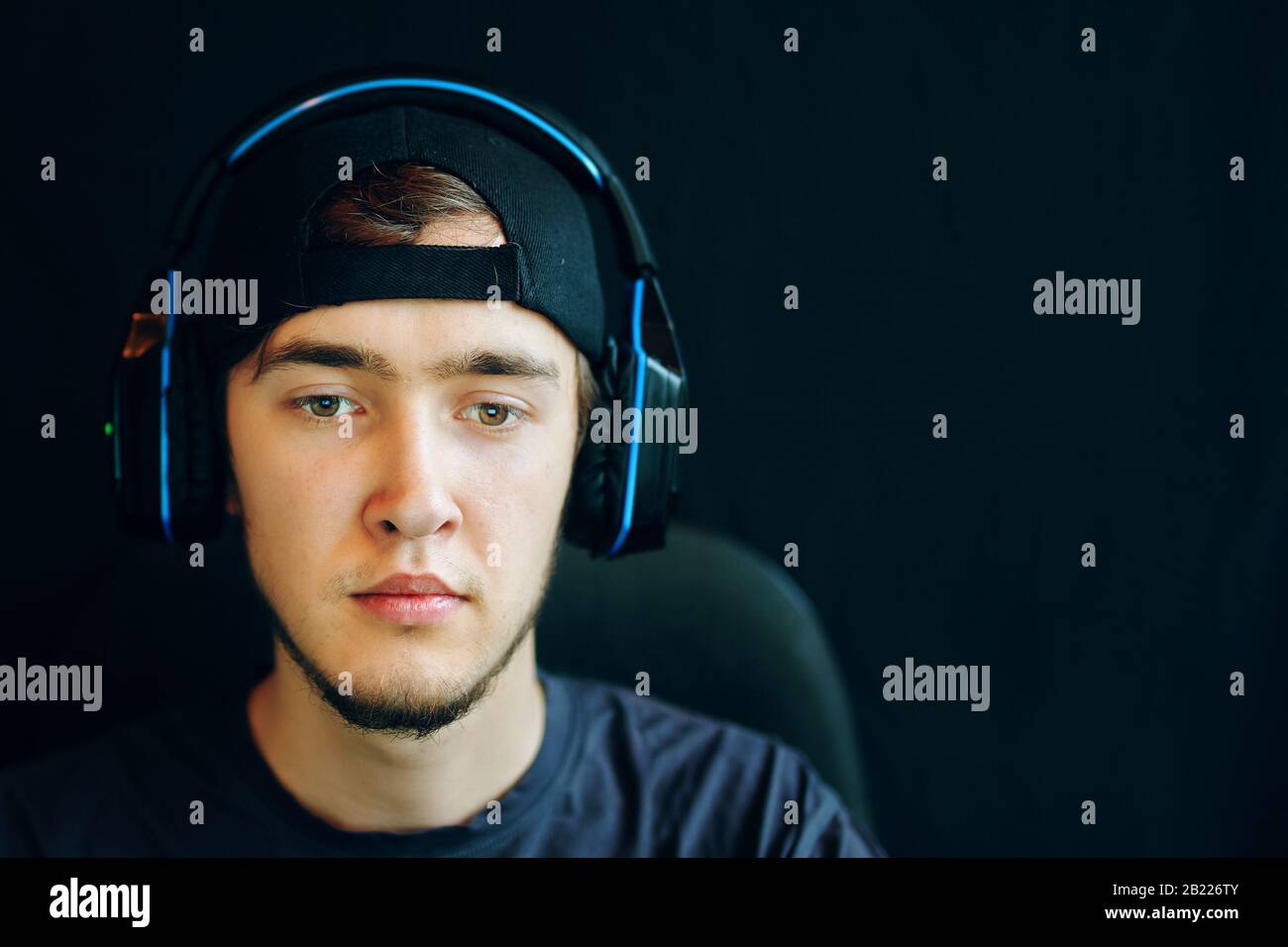 Cyber sport. Close-up of the face of a professional gamer involved in ...