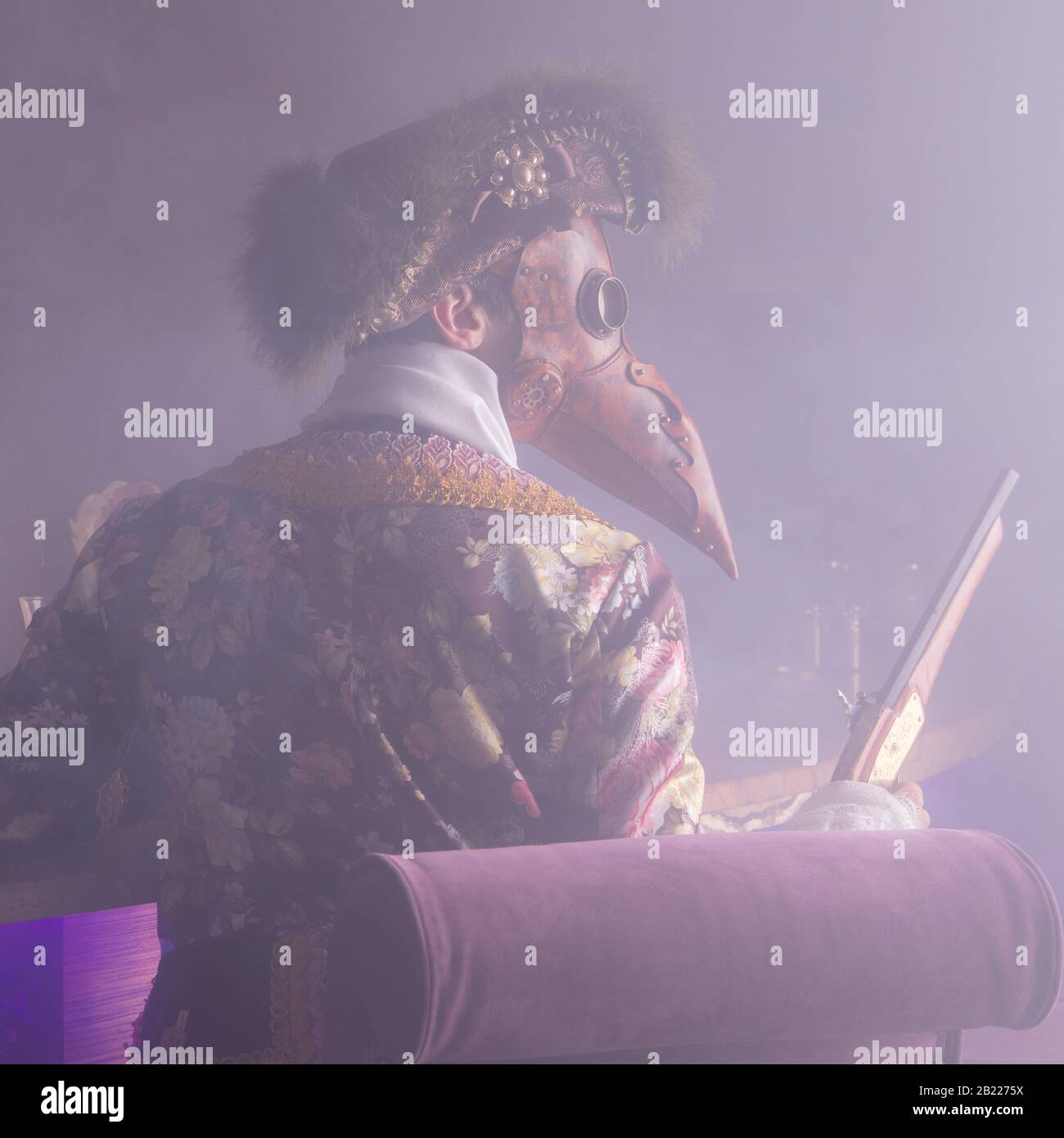 Actors in Steam punk masks and antique costumes indoor Stock Photo - Alamy