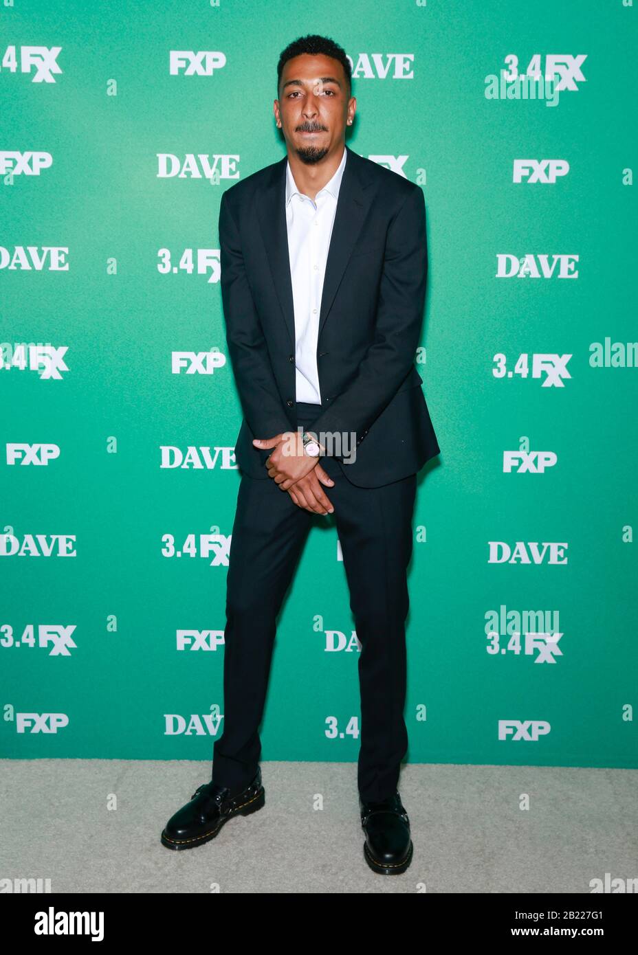 Los Angeles, CA - Feb 27, 2020: Travis Bennett attends the premiere of ...