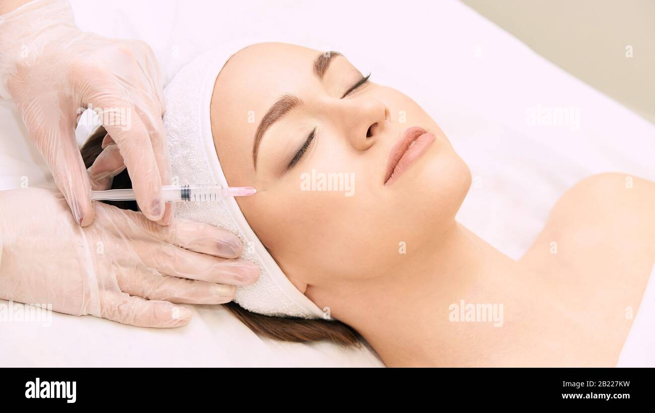 Anti wrinkle surgery. Beauty young woman injection. Facial treatment ...