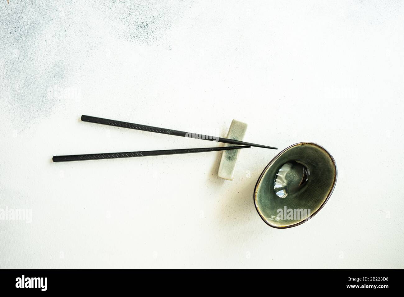 Asian table setting with chopsticks on stone background Stock Photo - Alamy