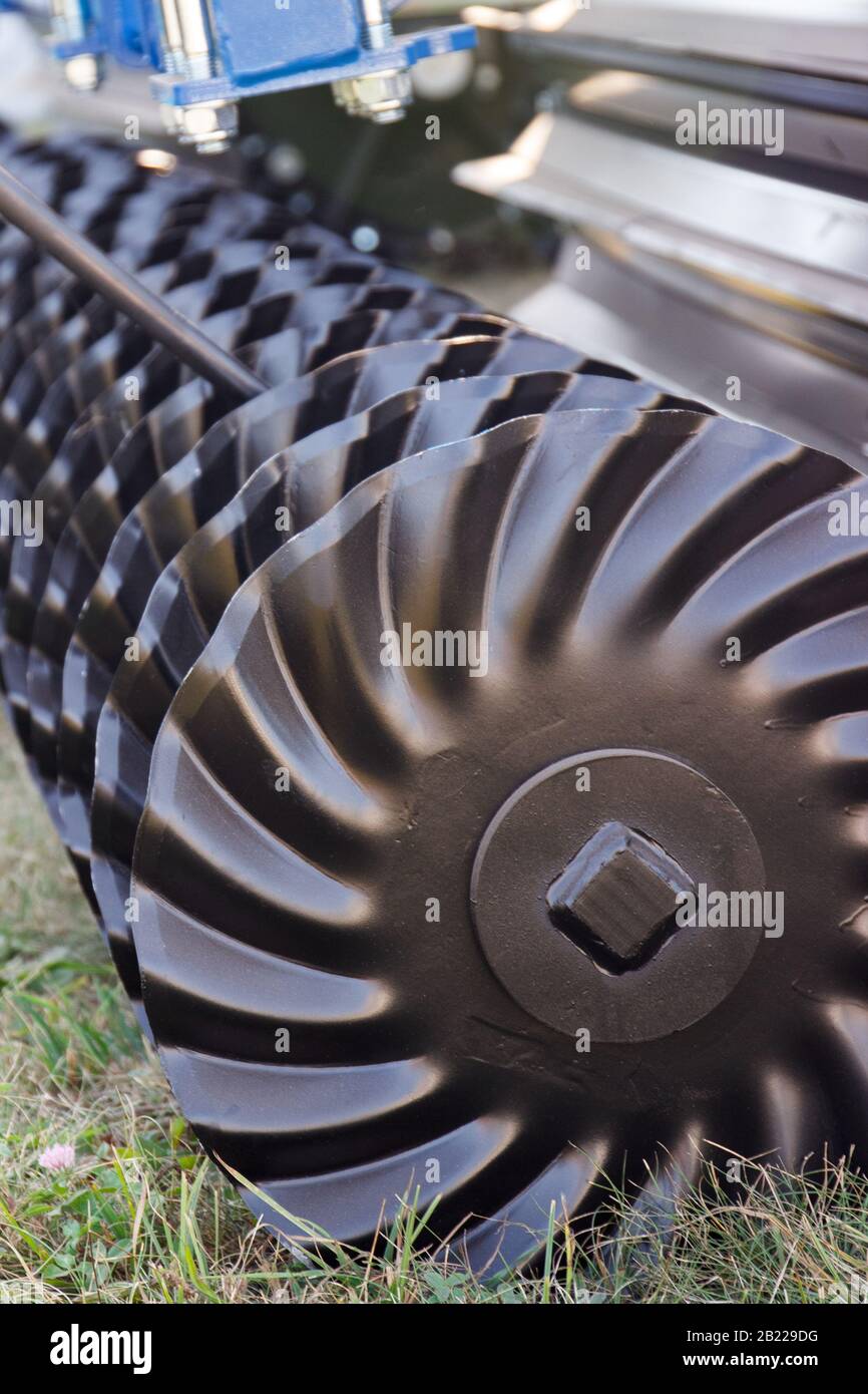 Black part and detail of agricultural disk harrow. Concept of modern ...