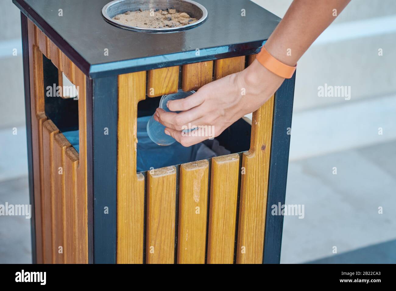 Hand throwing plastic water hi-res stock photography and images - Alamy