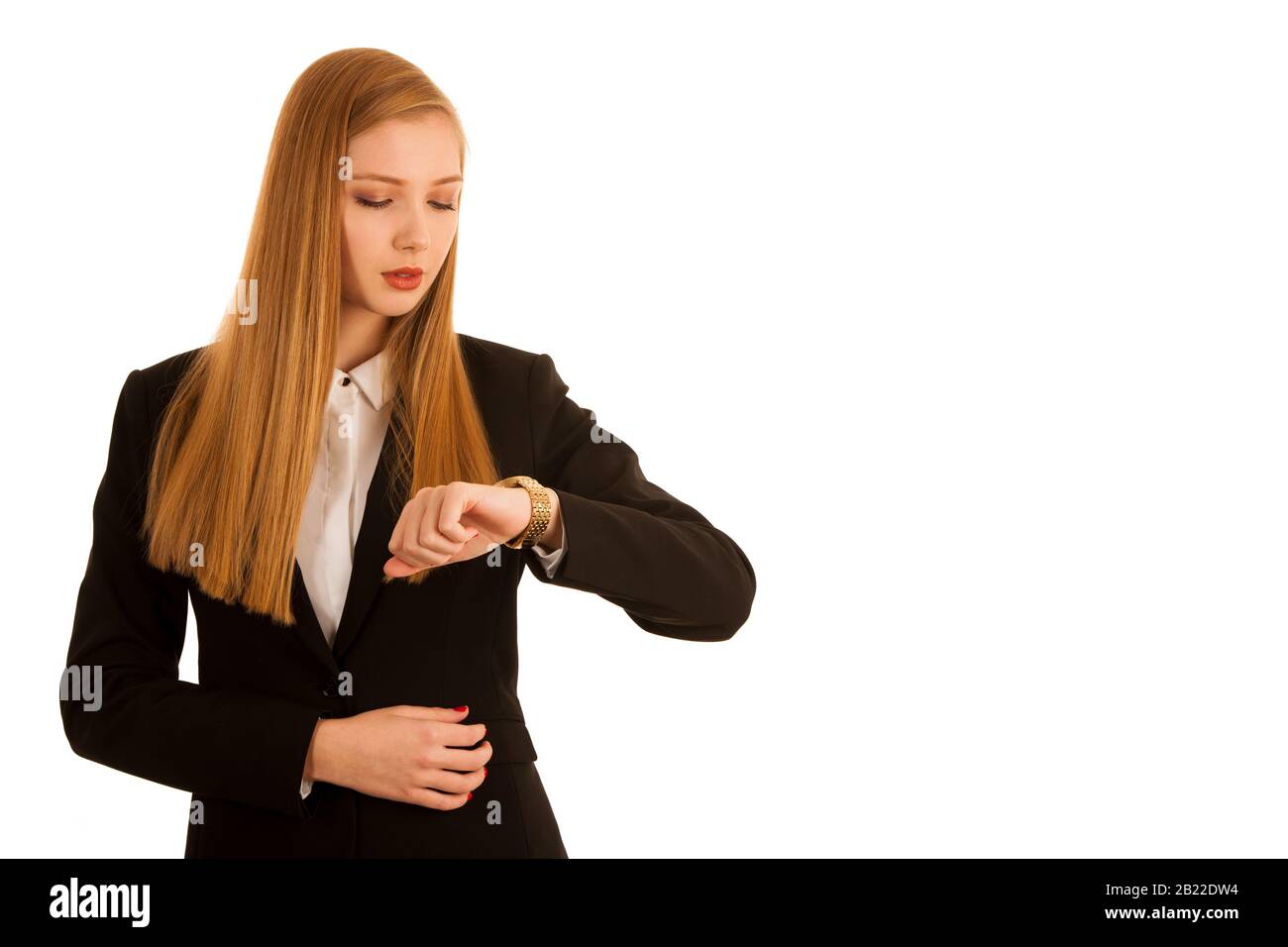 Young busienss woman checkihg watch isolated over white background ...