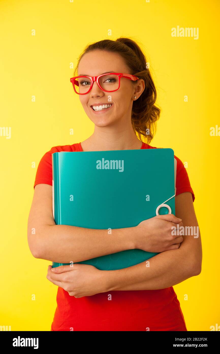 Nerdy woman wearing glasses hi-res stock photography and images - Alamy