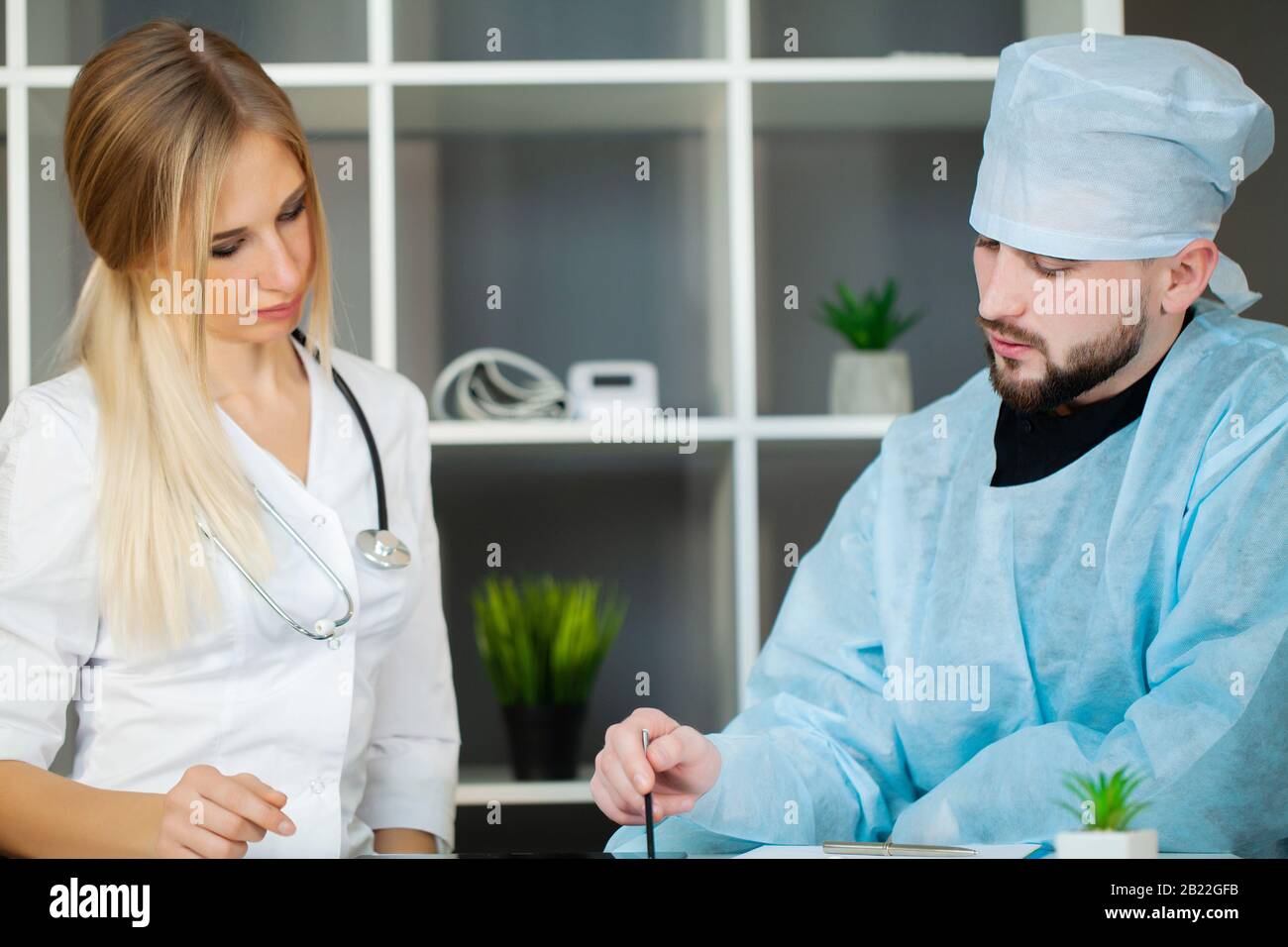 Doctor checks the health of the patient in the clinic Stock Photo - Alamy