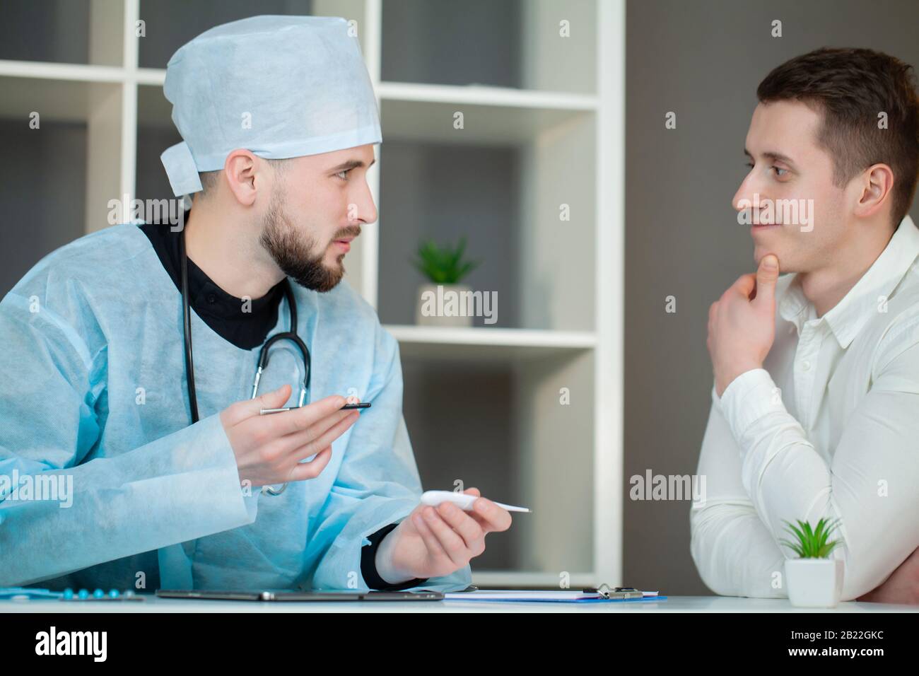 Doctor checks the health of the patient in the clinic Stock Photo - Alamy