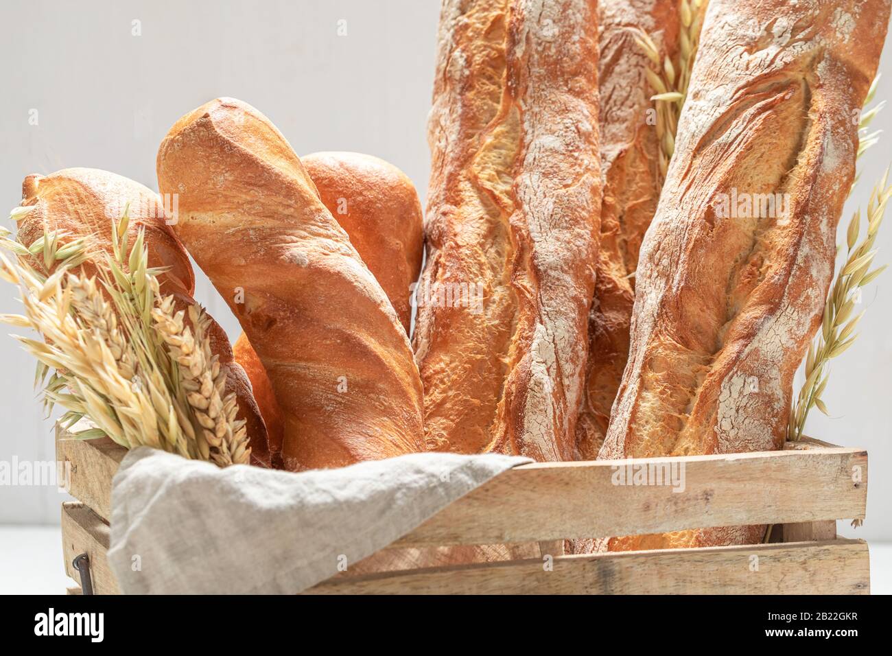 French baguettes ready to eat for breakfast in wooden box Stock Photo ...