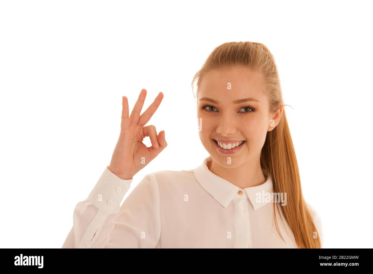 Beautiful business woman shows excellent sigh isolated over white ...