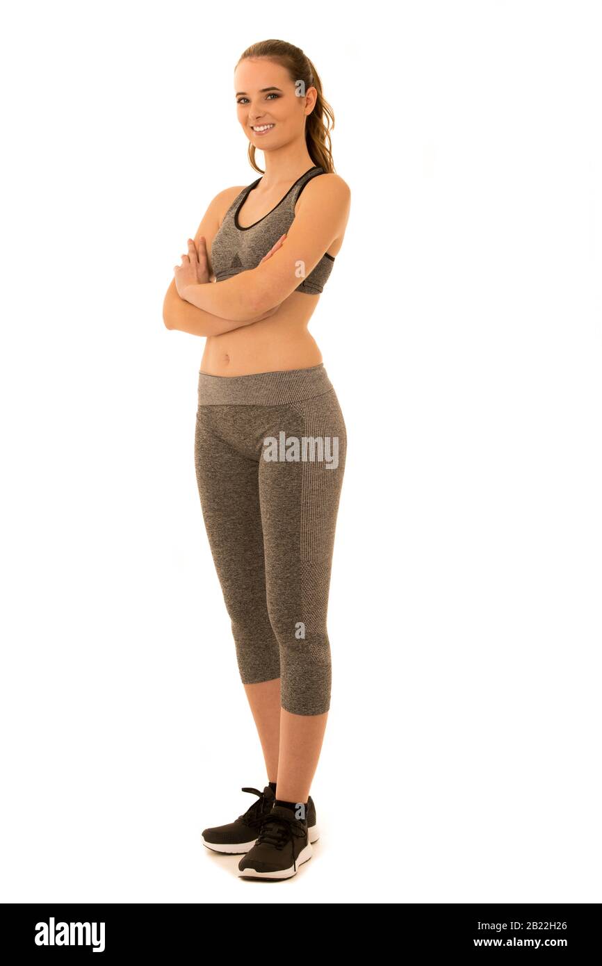 Beautiful young fit woman with great shape isolated over white ...