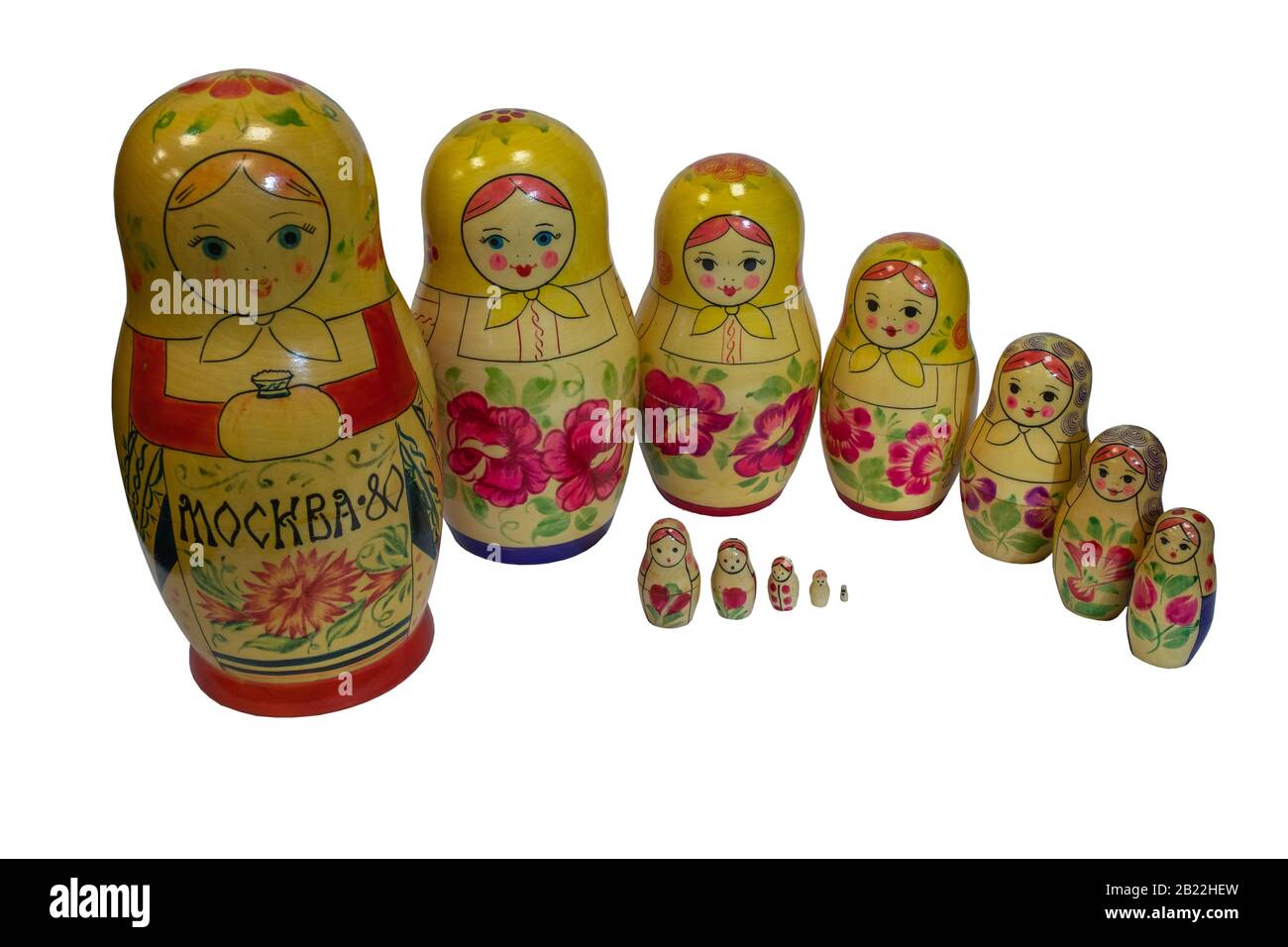 Set of twelve wooden nesting dolls with Olympic symbols on a white ...