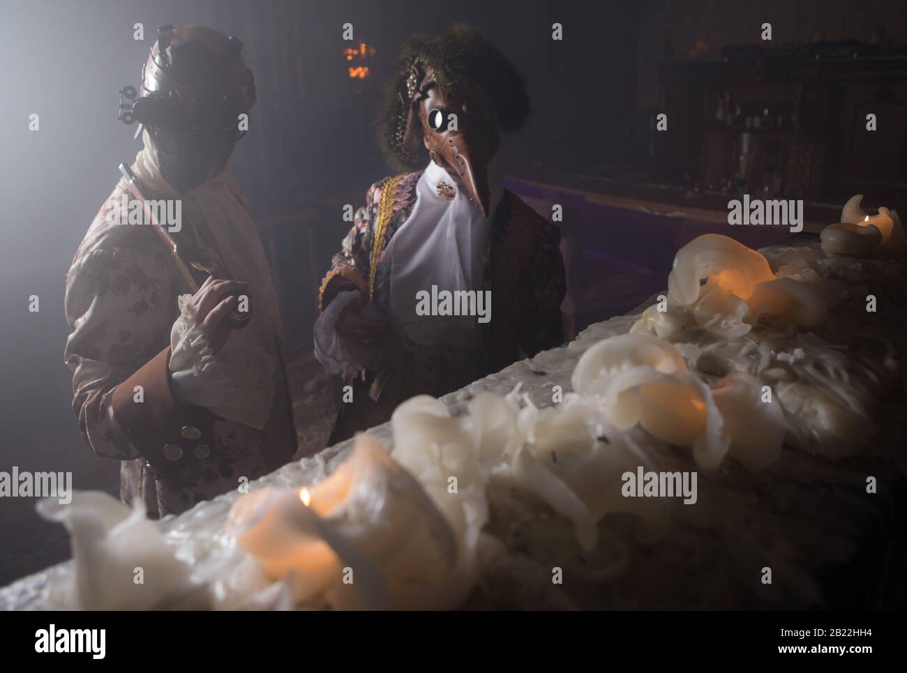 Actors in Steam punk masks and antique costumes indoor Stock Photo - Alamy