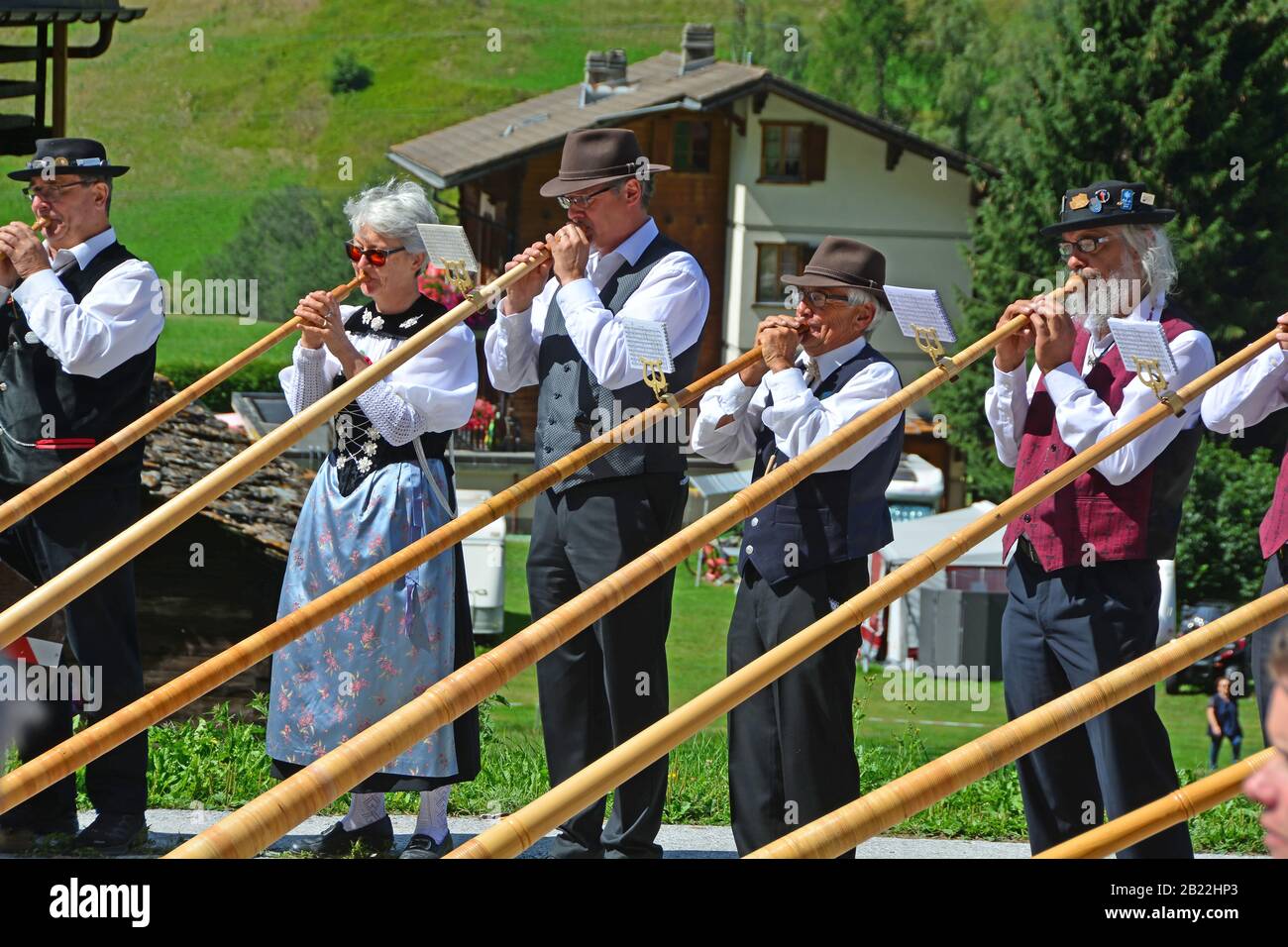 EVOLENE, SWITZERLAND - AUGUST 15: Alpine horn group in traditional ...