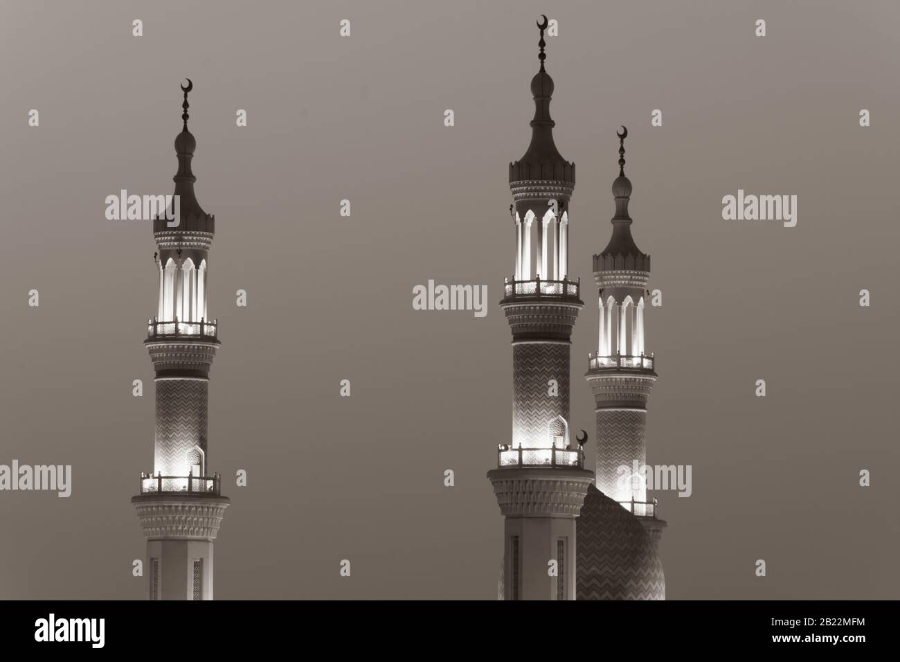 Islamic mosque spires in black and white echos prayer calls at night ...