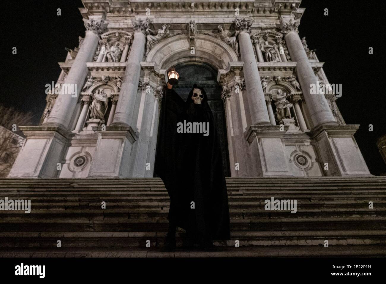 VENICE, ITALY - FEBRUARY 25: Plague doctors pose in Venice on February ...