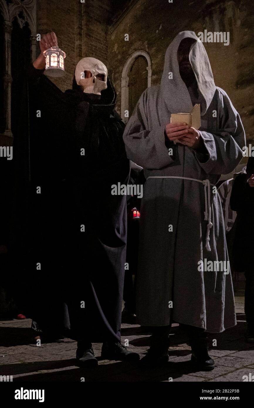 VENICE, ITALY - FEBRUARY 25: Plague doctors pose in Venice on February ...