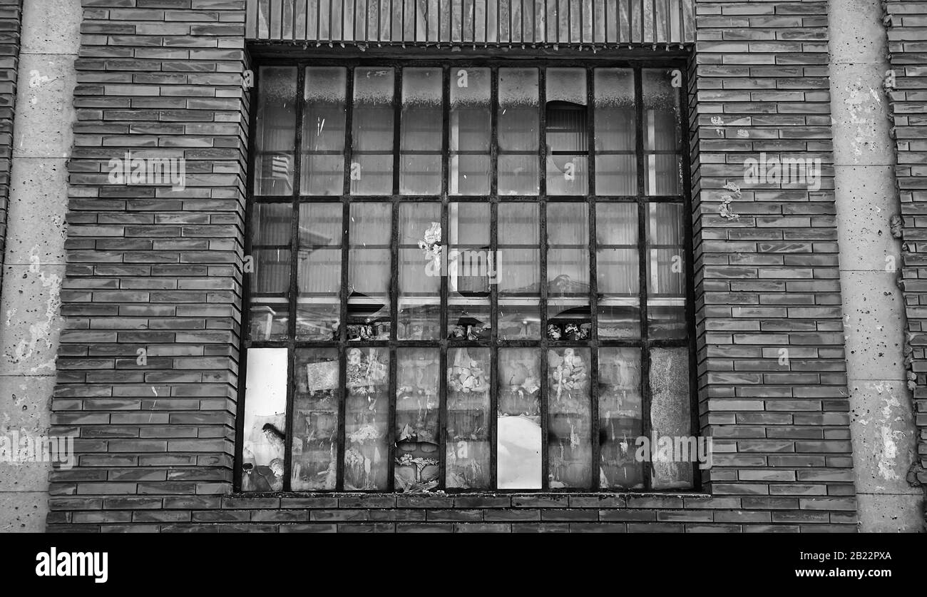 Windows with bars in urban building, construction and architecture ...