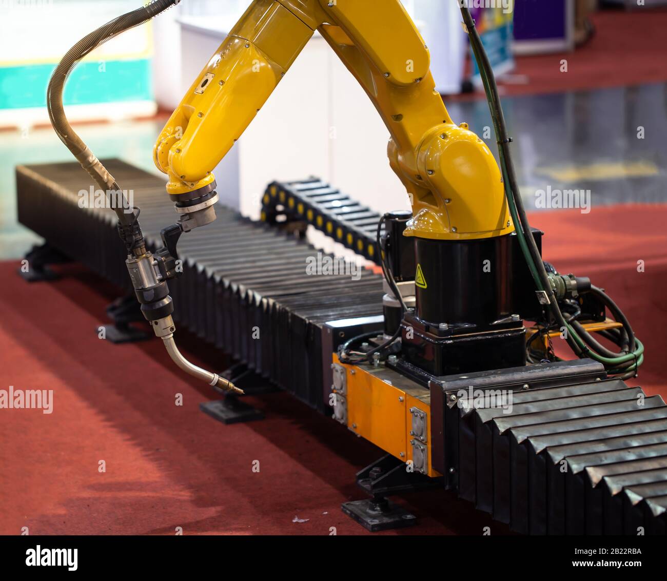 Automatic robotic welding arm in modern factory Stock Photo - Alamy