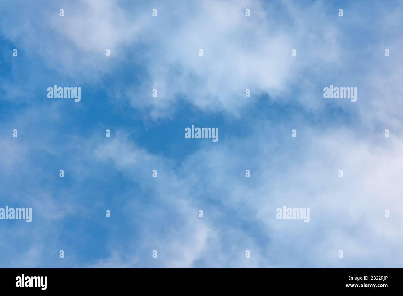 texture of a colorful sky with clouds and sun Stock Photo - Alamy