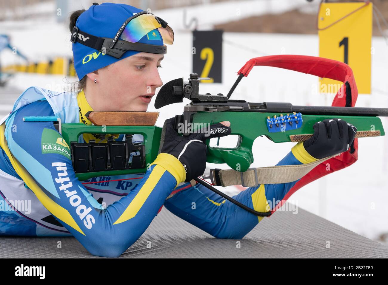 Biathlete Kryukova Arina Republic of Kazakhstan rifle shooting in prone ...