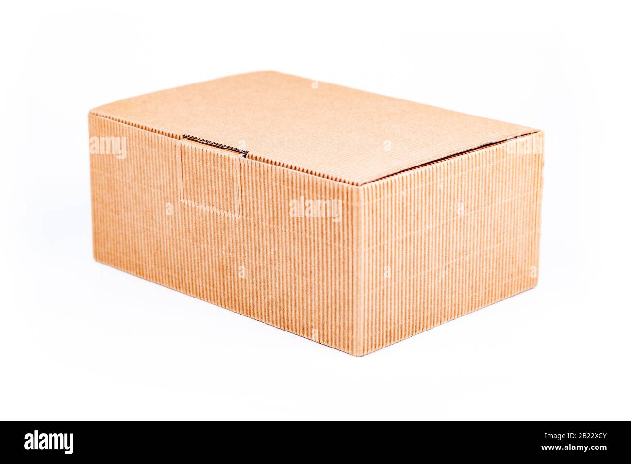 Simple single small brown corrugated cardboard delivery carton box with ...