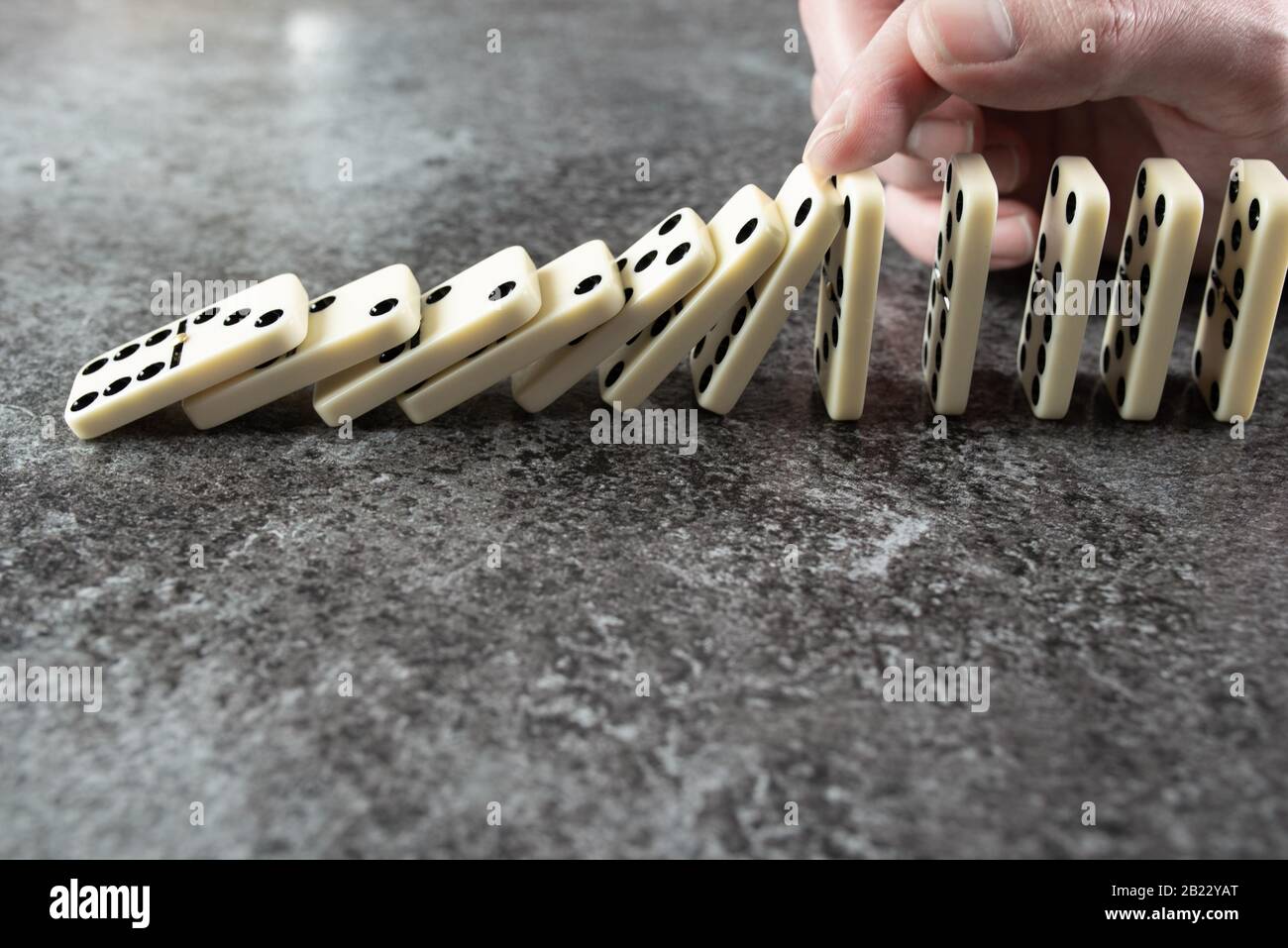 Dominoes falling hi-res stock photography and images - Alamy