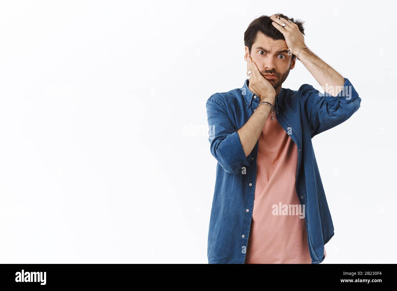 Guy looking how everything falls-apart. Distressed and speechless upset ...