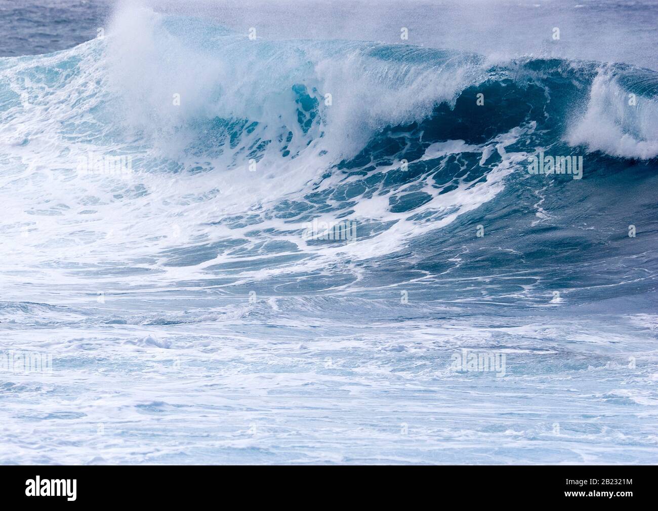 Storm waves crashing onto the beach Stock Photo - Alamy