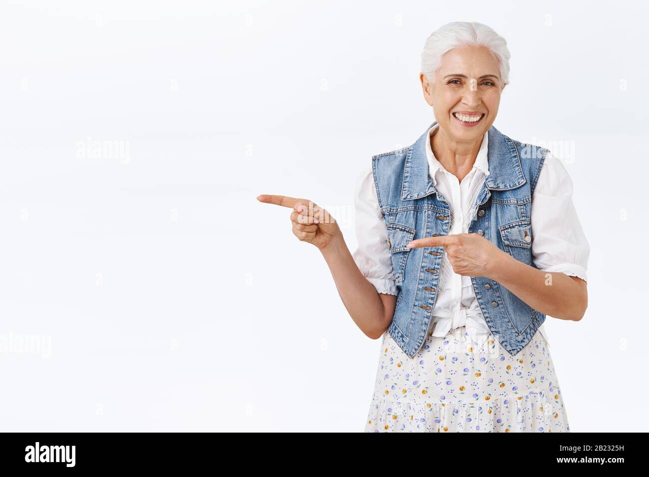 Cheerful, enthusiastic carefree old woman, grandmother with grey hair ...
