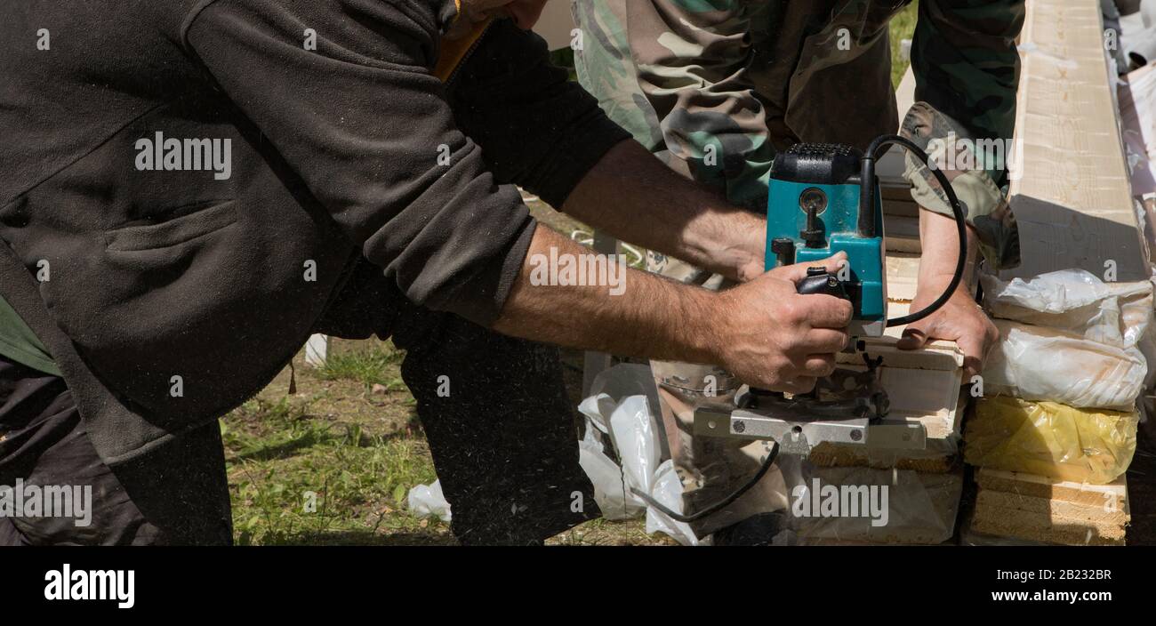 Construction worker working plywood hi-res stock photography and images ...