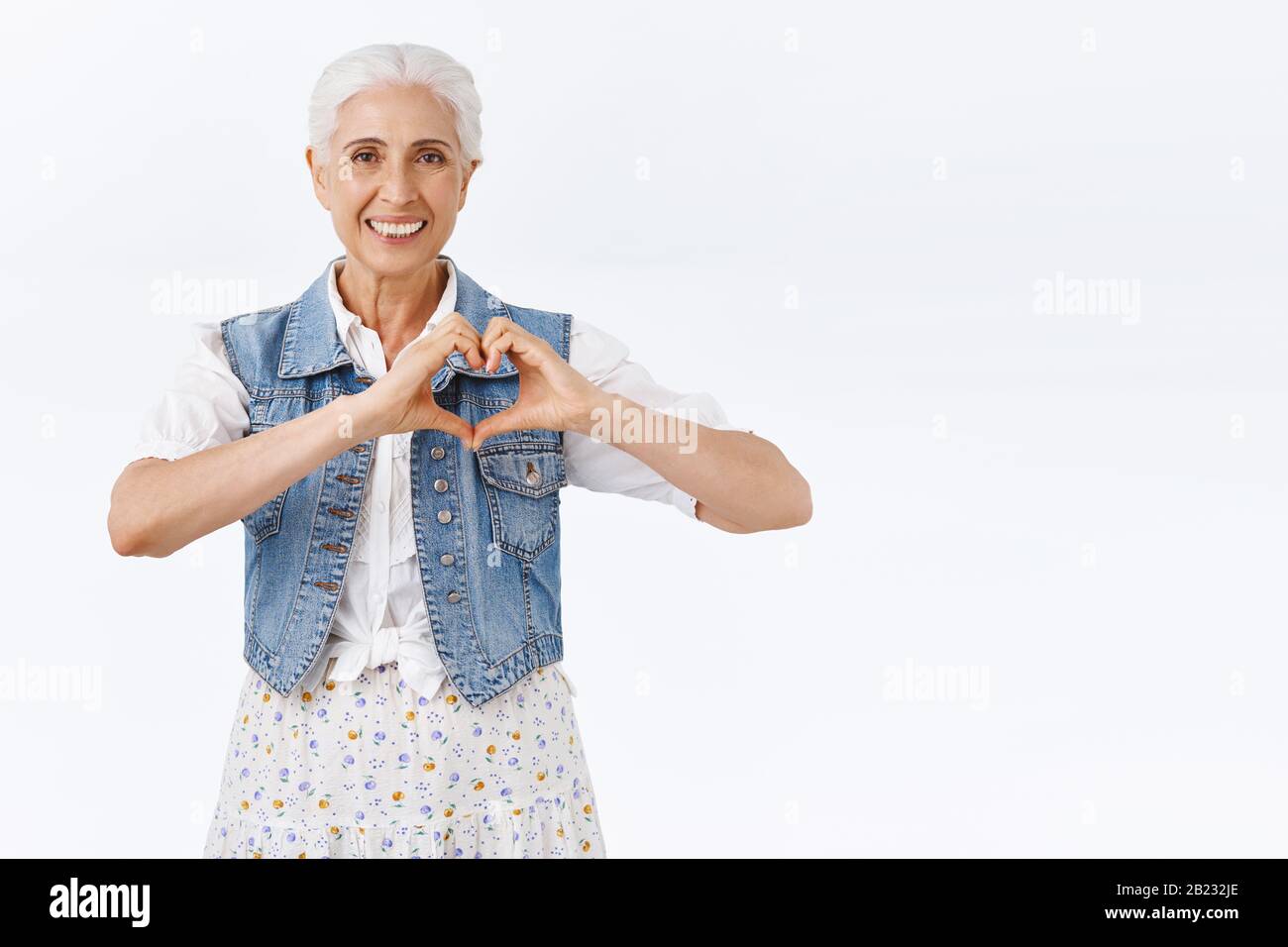 Charming lively and carefree caucasian senior woman, old lady showing ...