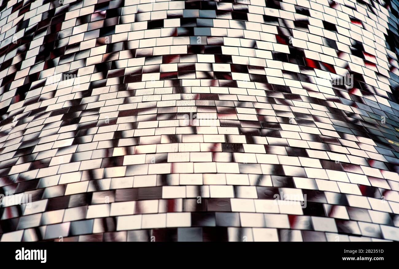 Colorful square metallic tiles on a wall or floor. Blue, green, teal ...