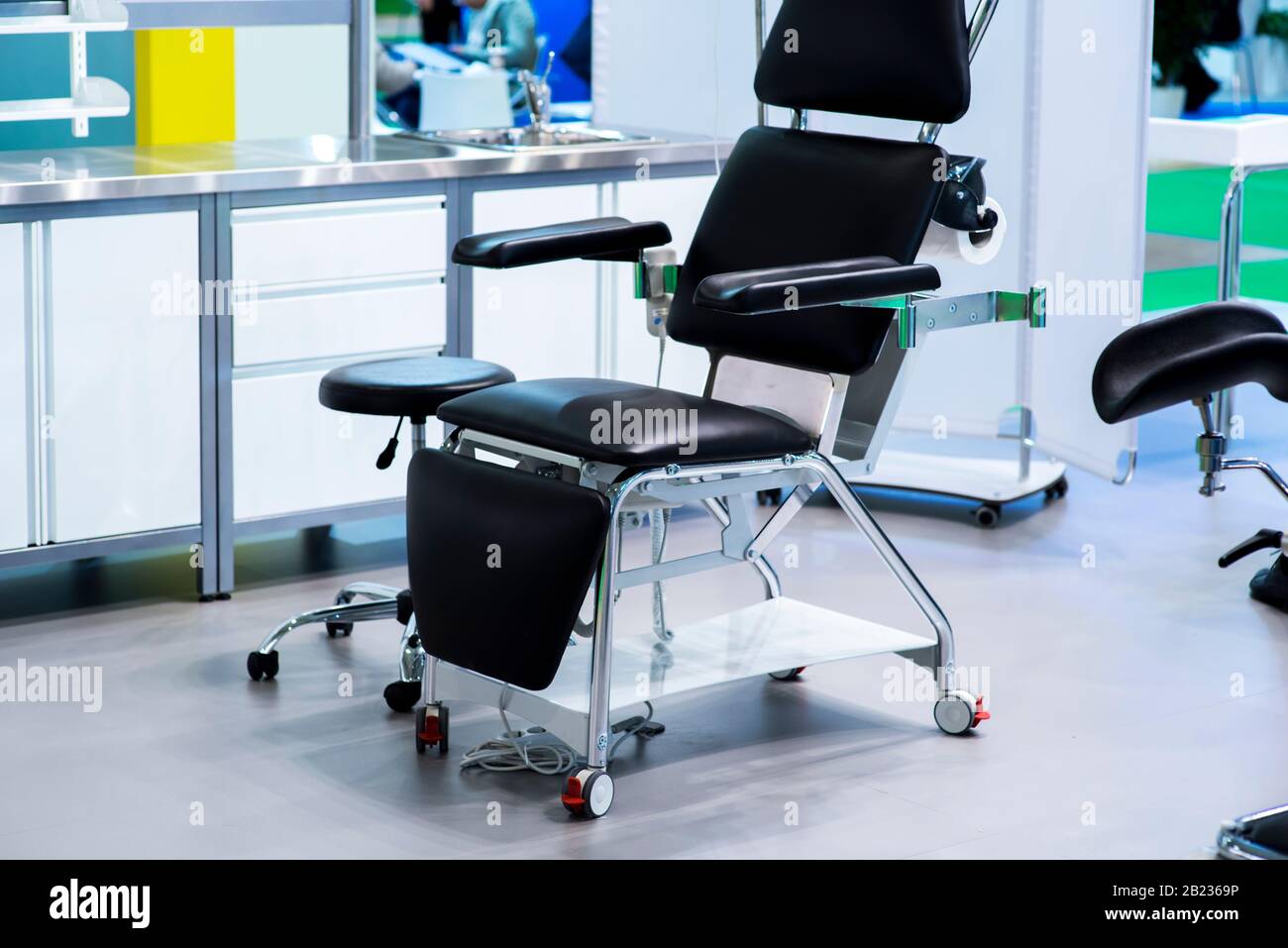 Blue gynecological chair in medical office in clinic. Modern interior ...