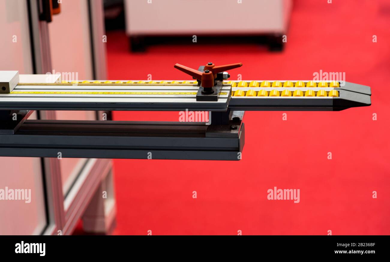 Rotary die cutting machine with slitting blade system Stock Photo - Alamy