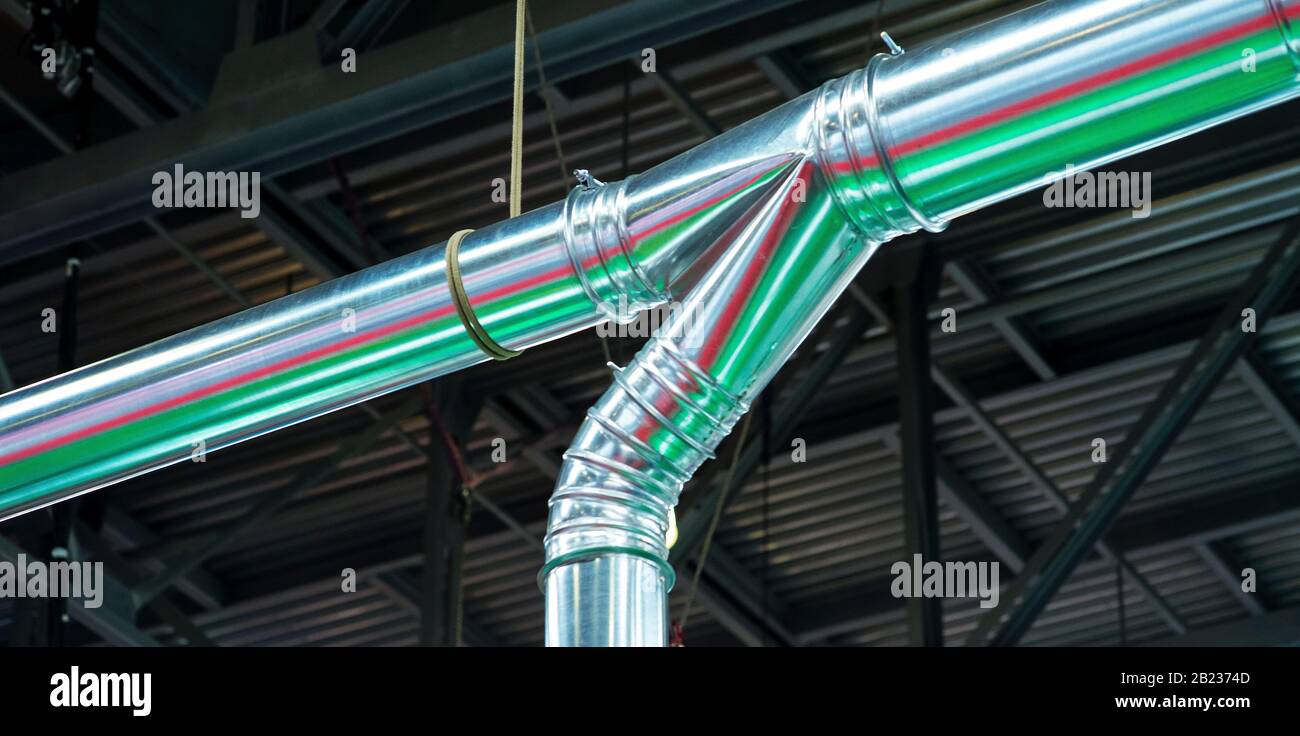 Equipment, cables and piping as found inside of a modern industrial ...