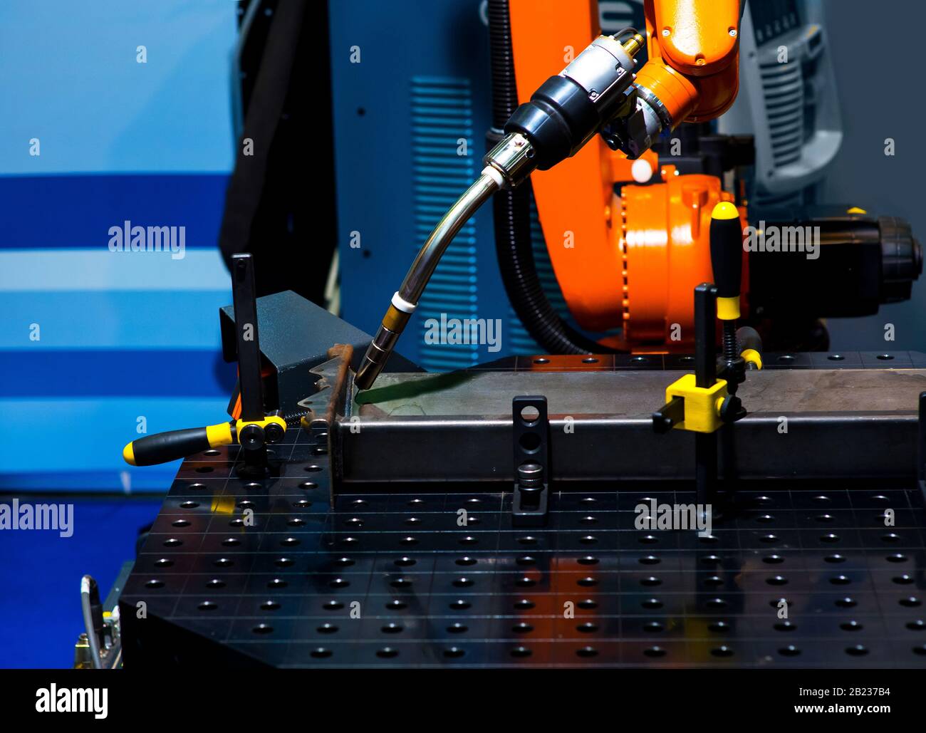Automatic robotic arm for metal welding operations Stock Photo - Alamy