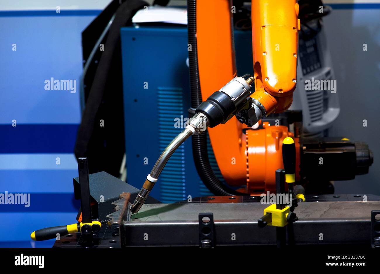 Automatic robotic arm for metal welding operations Stock Photo - Alamy