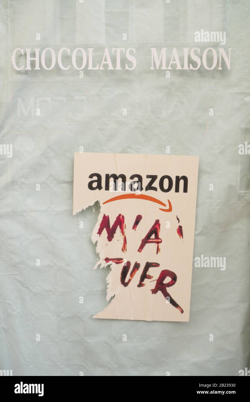 "Amazon Killed me", poster on the window of a closed shop, Mâcon ...